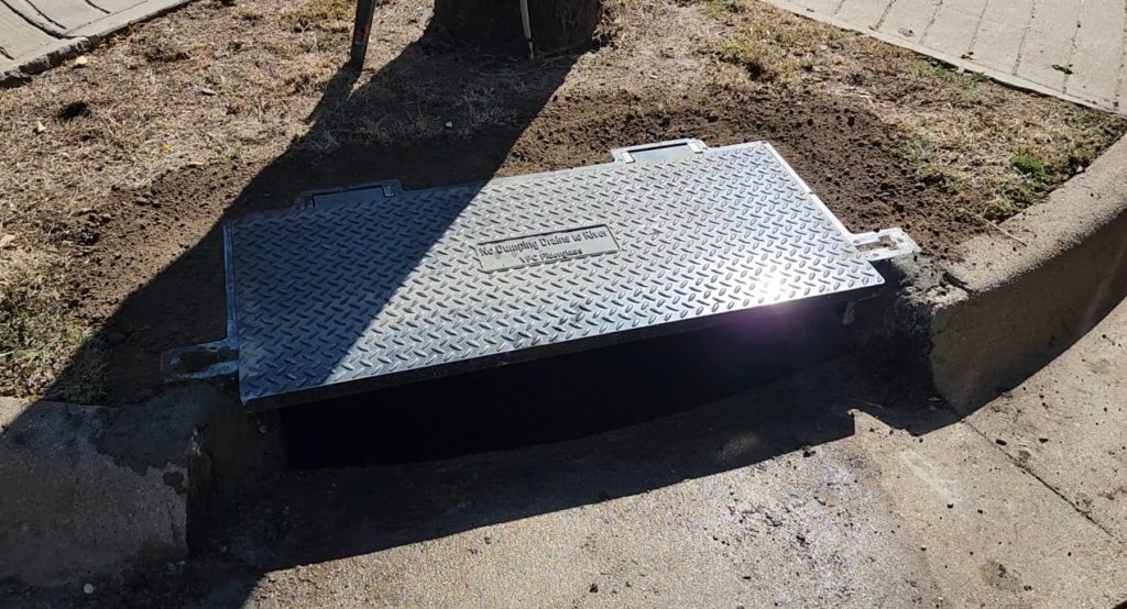 Storm Drain Manhole Cover - Virtual Polymer Compounds, LLC