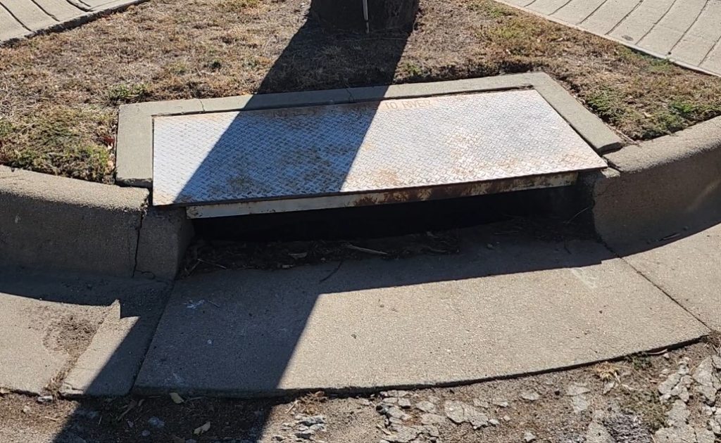 Storm Drain Manhole Cover - Virtual Polymer Compounds, LLC